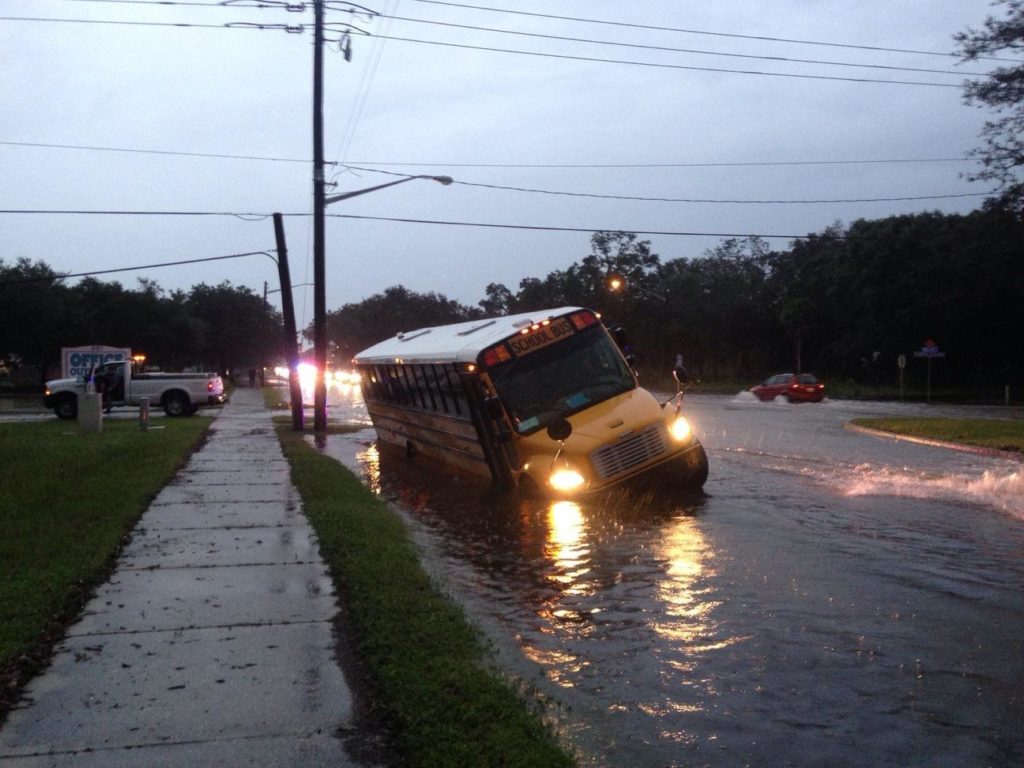 Schools in Venice refuse to close during flooding; school bus nearly ...